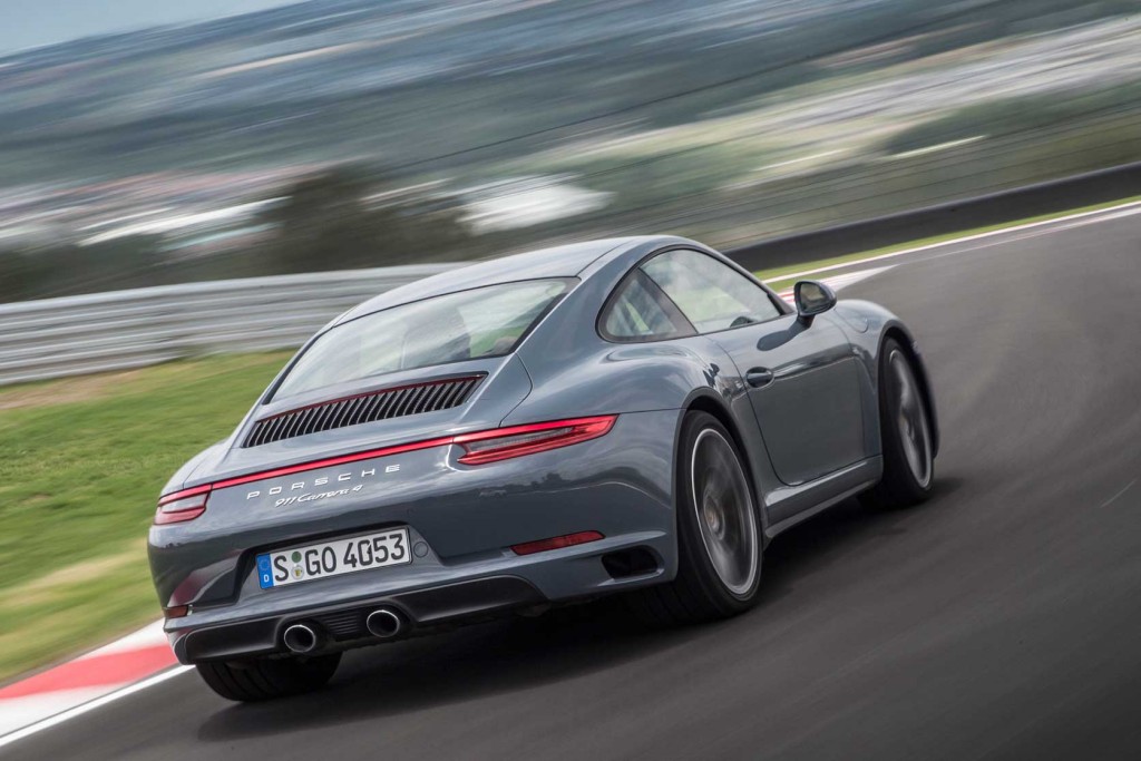 Why Are People Still Obsessed With the Porsche 911? - Sharp Magazine